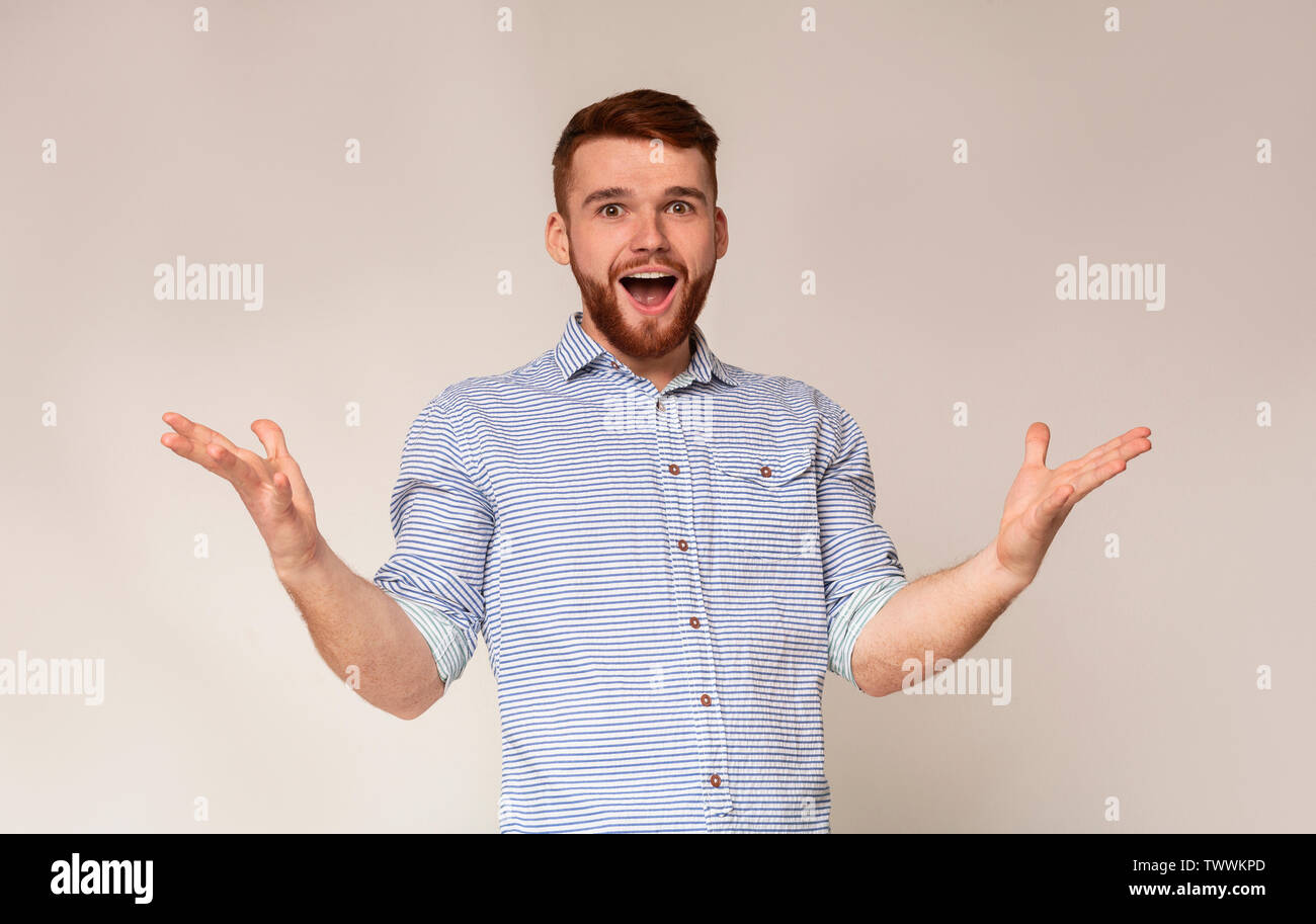 Young exited man raising hands and happy screaming Stock Photo - Alamy