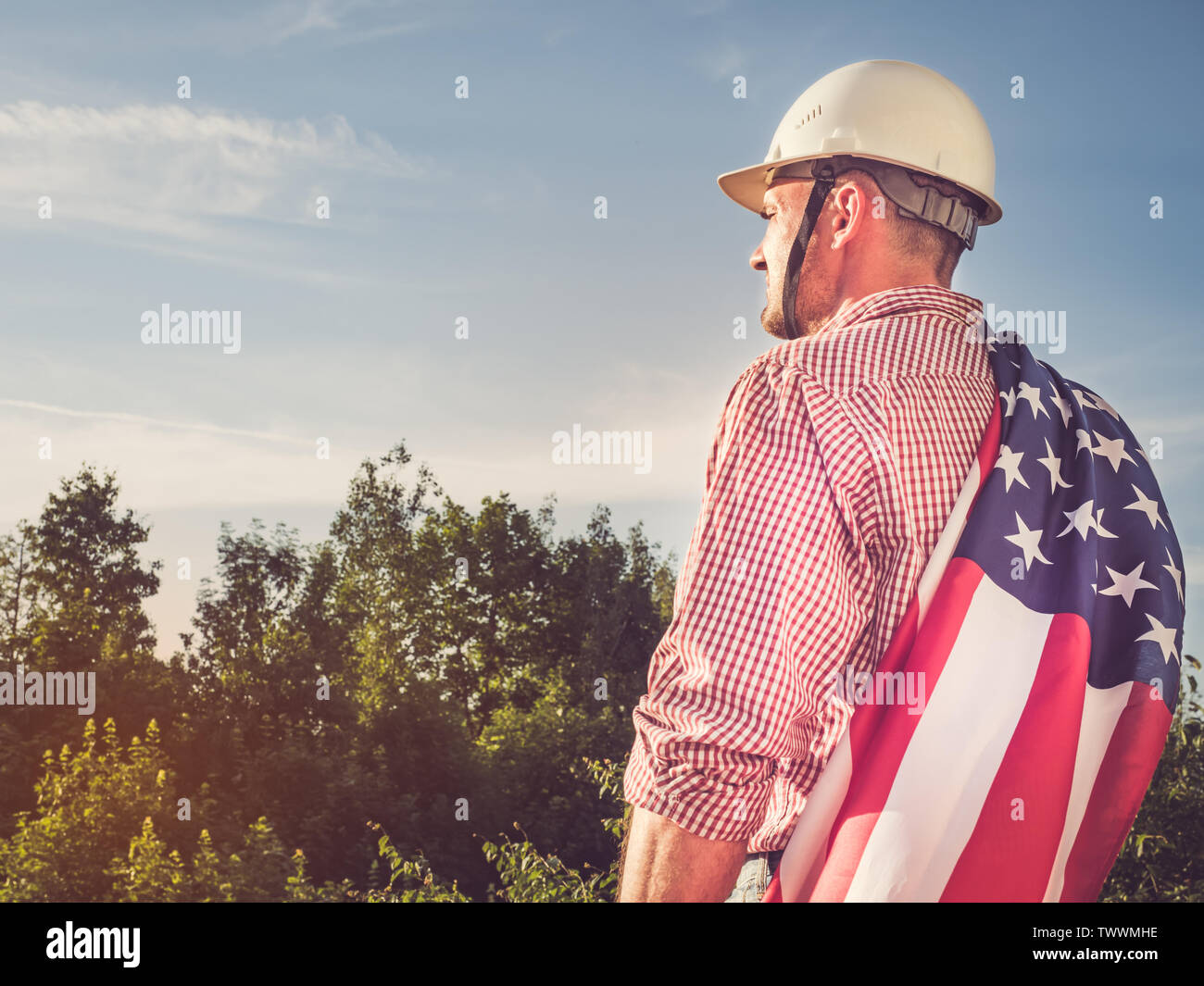 Young engineer, white hardhat and American Flag Stock Photo - Alamy