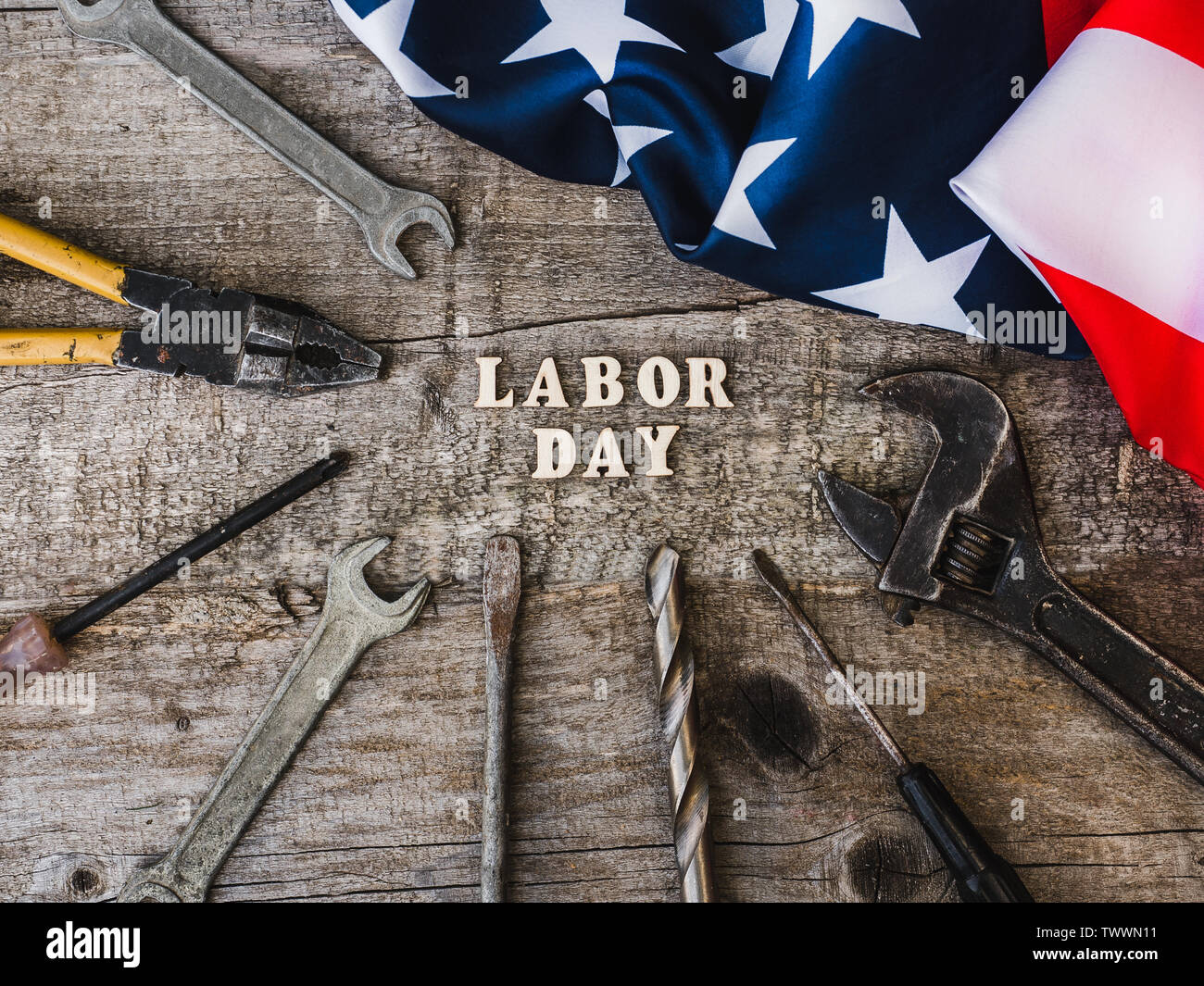 LABOR DAY. Hand tools and wooden letters Stock Photo - Alamy