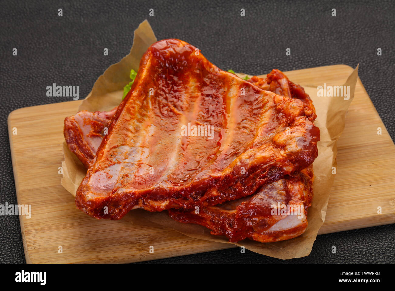 Raw marinated pork ribs ready for cooking Stock Photo - Alamy
