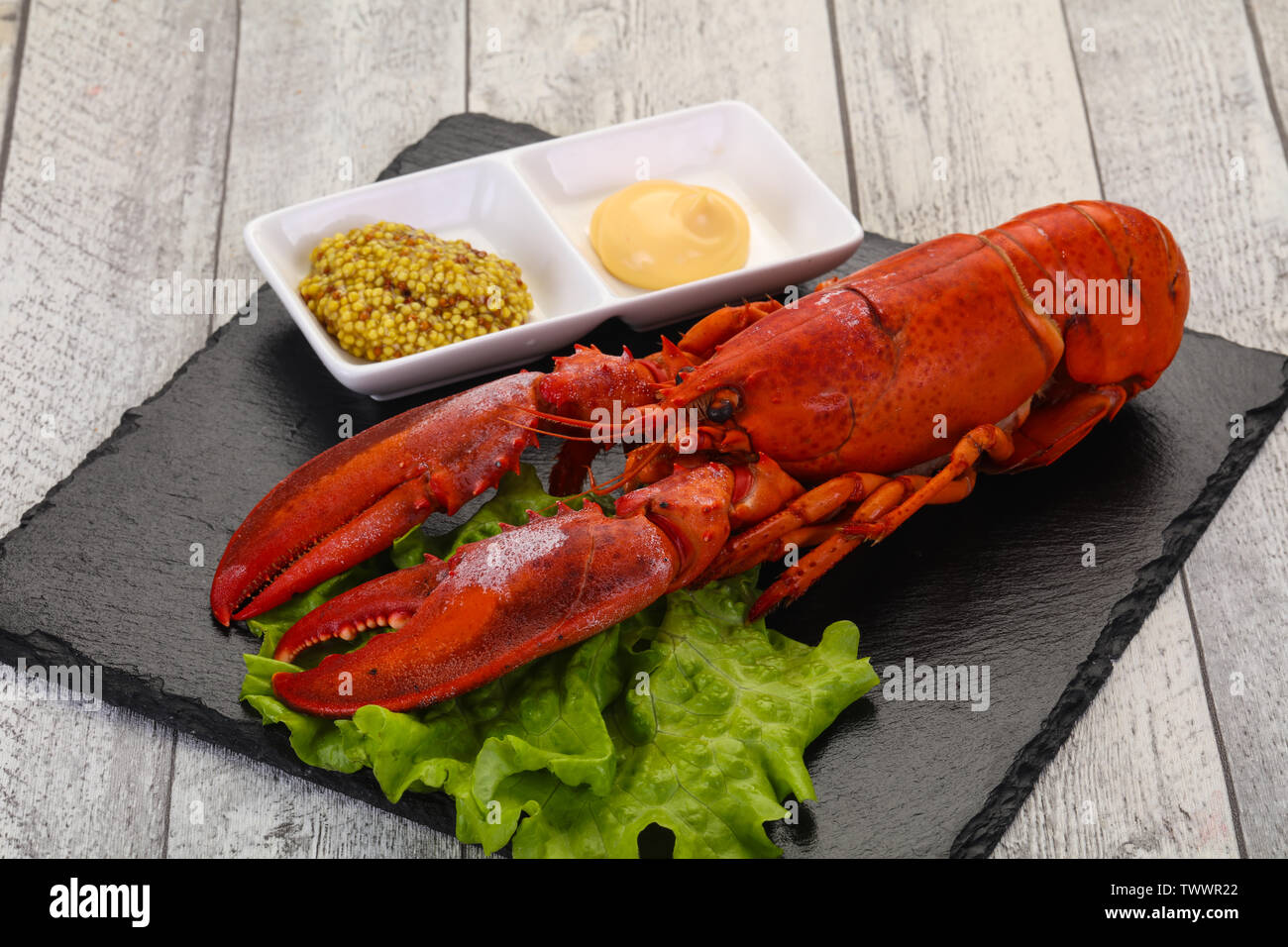 Luxury Lobster with sauces - ready for eat Stock Photo - Alamy