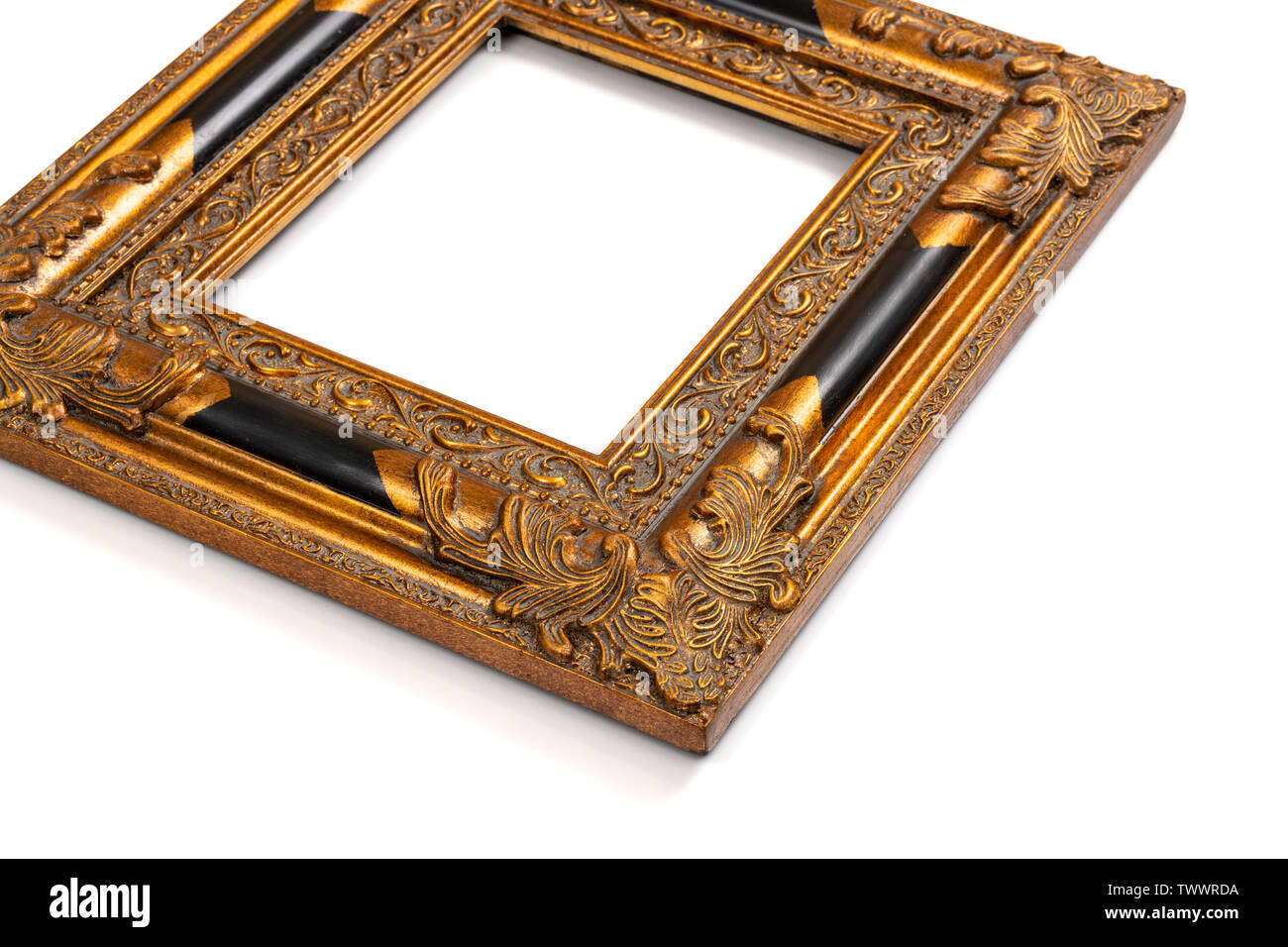 Ornate wood golden picture frame isolated on white Stock Photo - Alamy