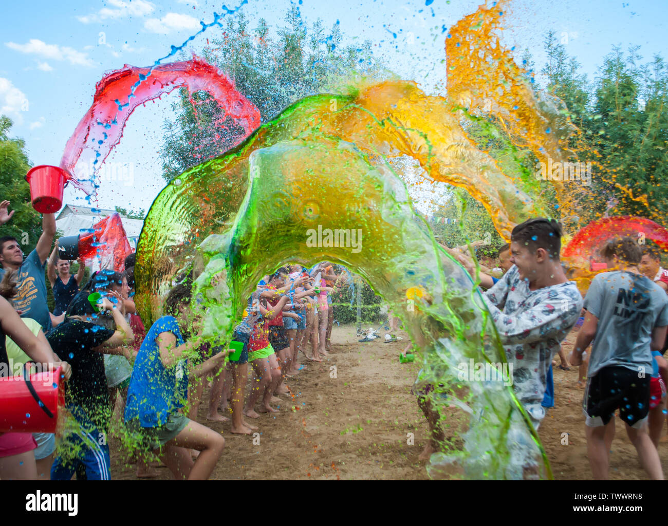 Odesa rgn. Ukraine, August 7, 2018: Teenagers splashing in colored ...