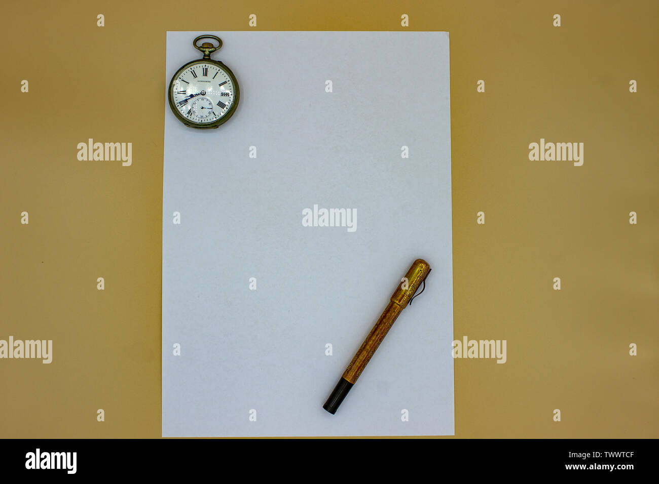 Naples Italy. On a white sheet, an old gold fountain pen. The pen dates ...
