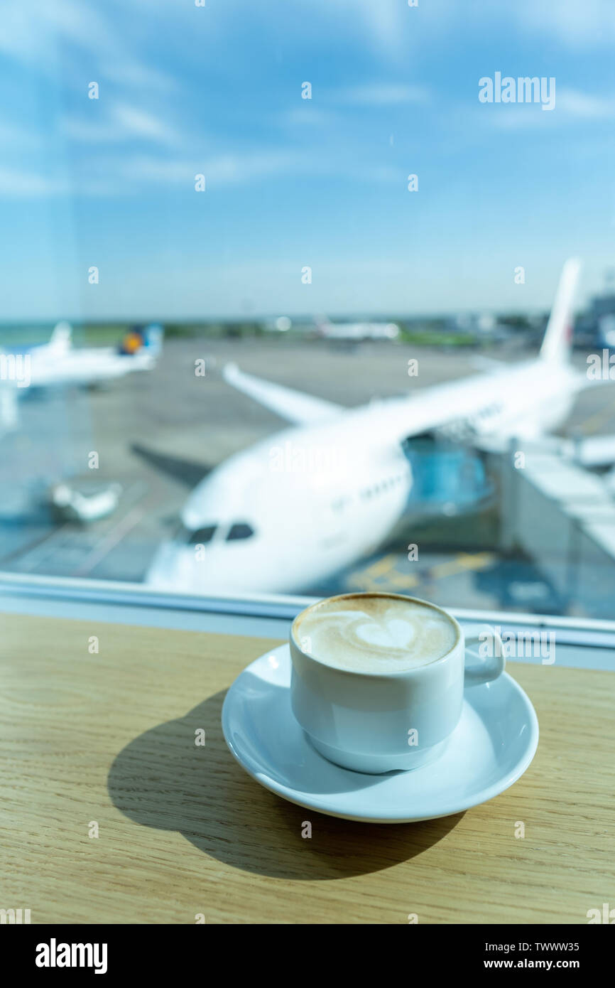 Cup of tea in airport's business lounge. Waiting for the flight ...