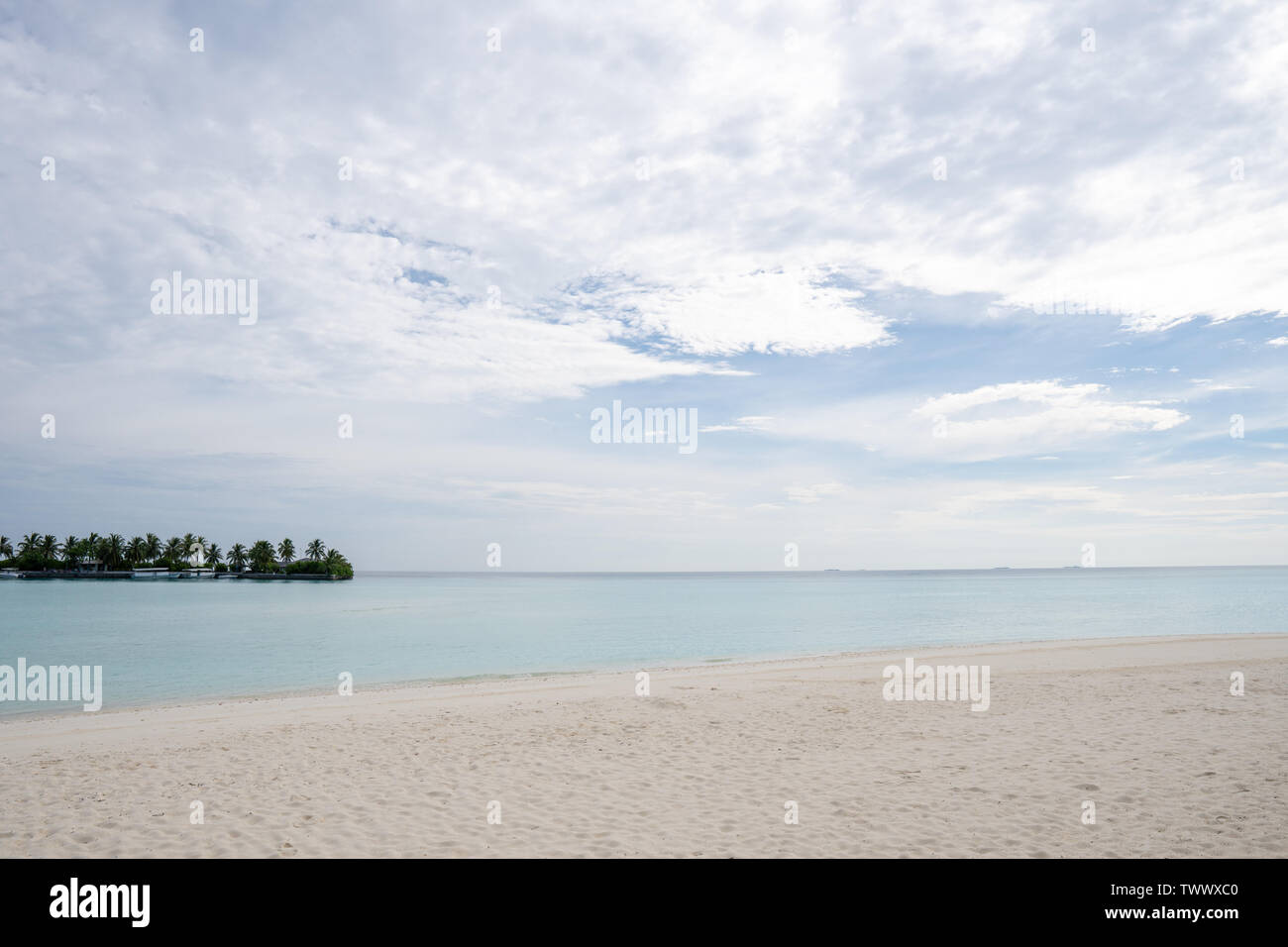 Wide sandy beach on a tropical island in Maldives. Indian ocean Stock ...