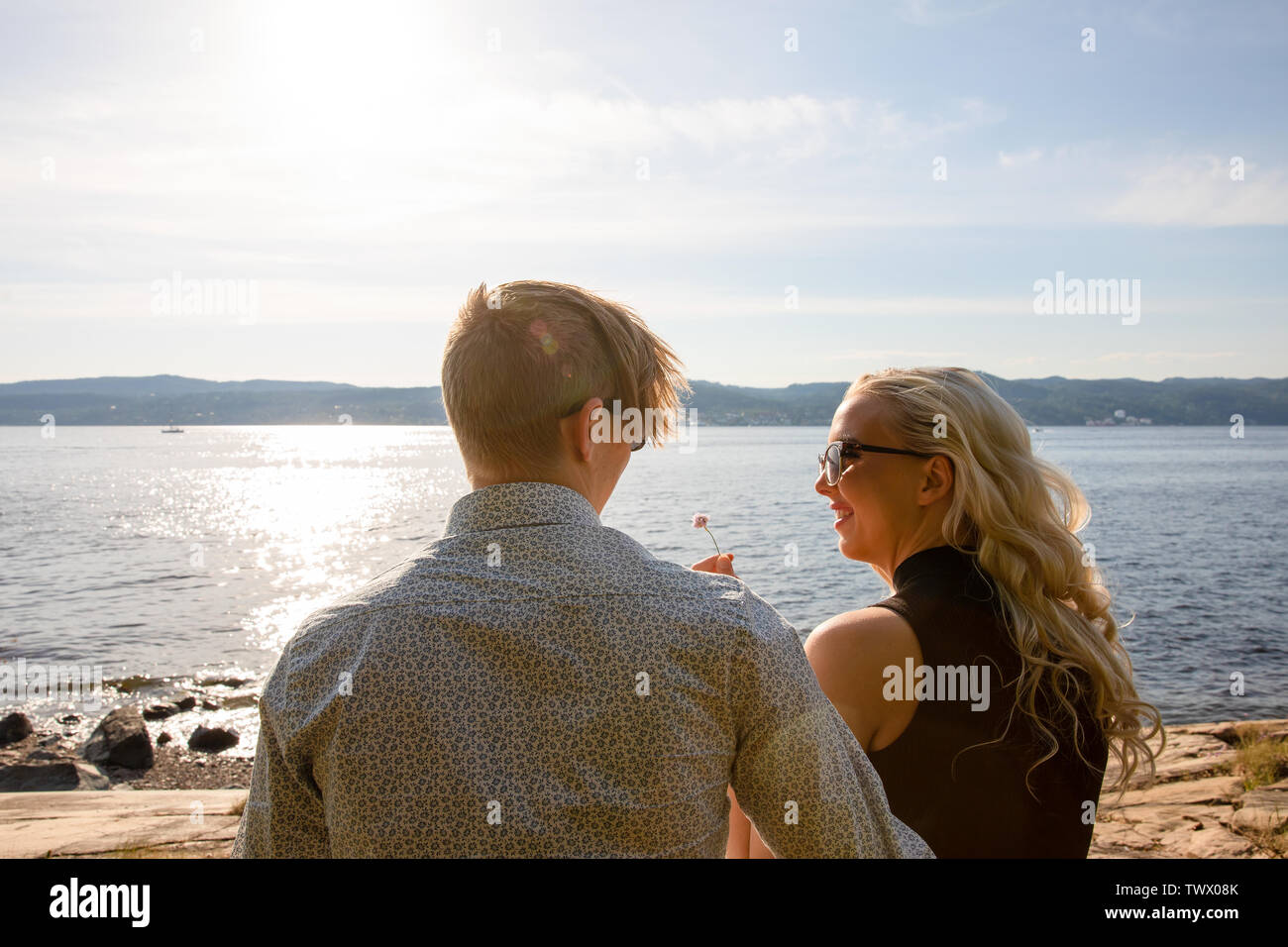 Young Couple Sharing Leisure Time At Beach Stock Photo - Alamy