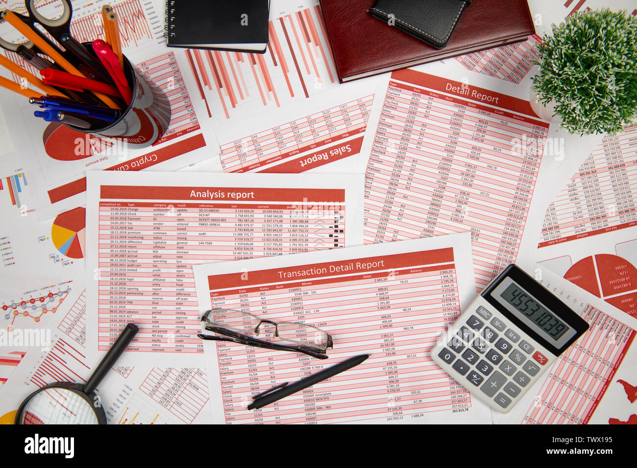Business reports, data tables and charts - directly above view of ...