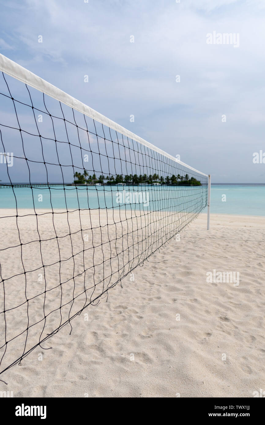 Volleyball court on the beach of a tropical island Stock Photo - Alamy