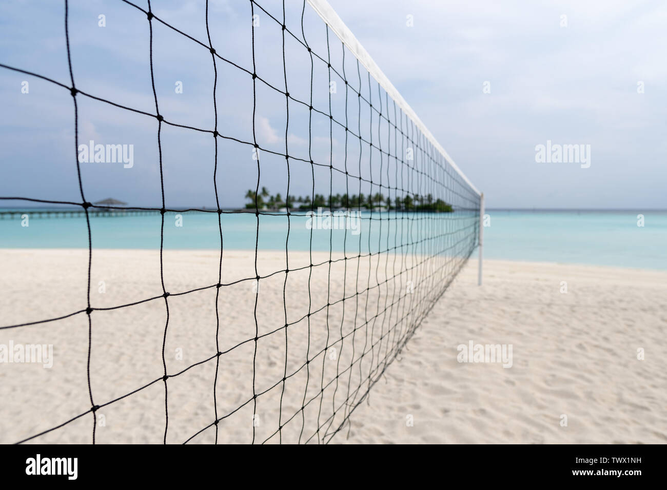 Volleyball court on the beach of a tropical island Stock Photo - Alamy