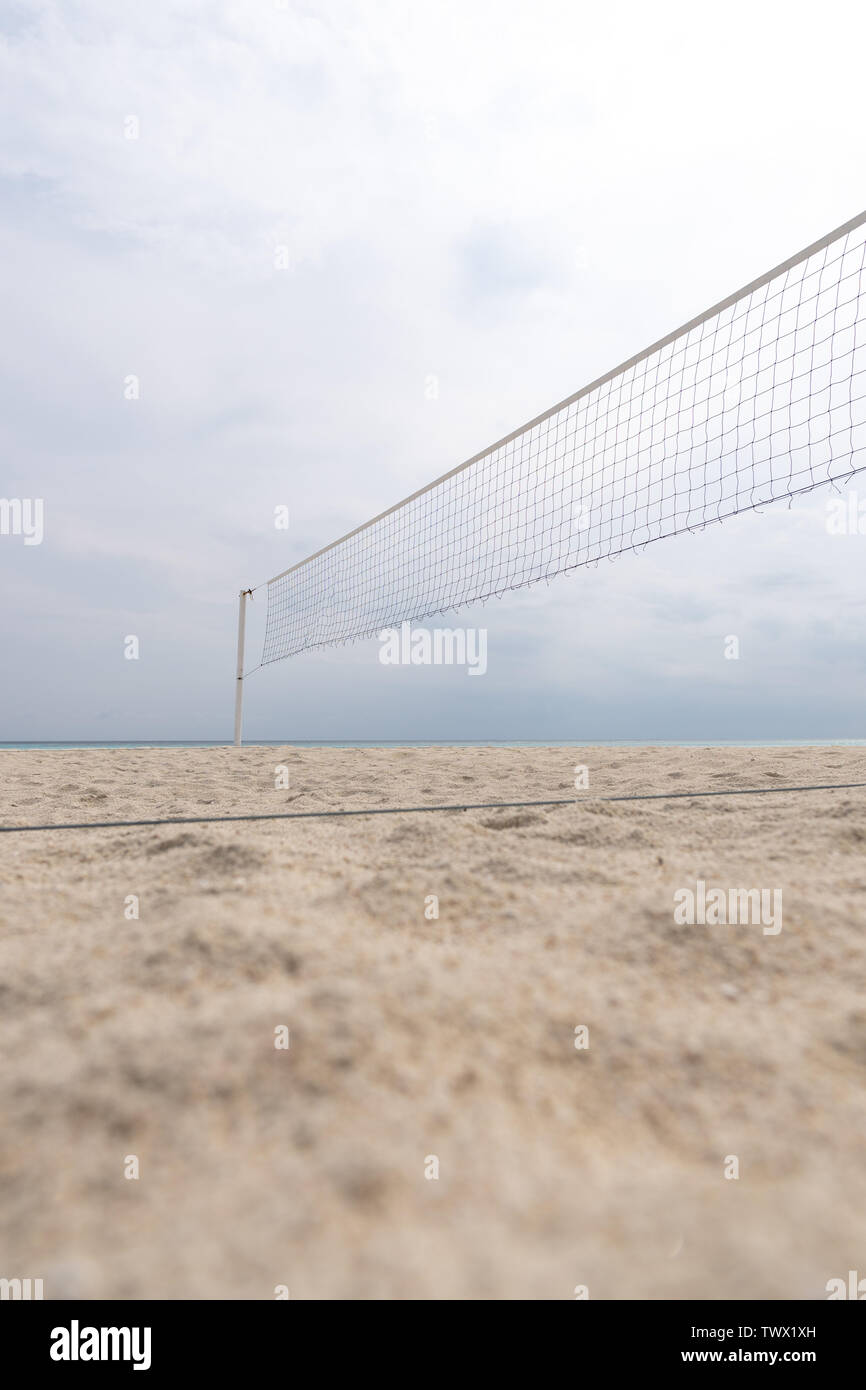Volleyball court on the beach of a tropical island Stock Photo - Alamy