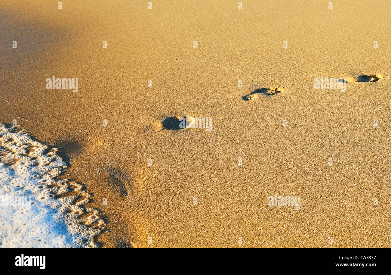 Human traces on the beach Stock Photo - Alamy