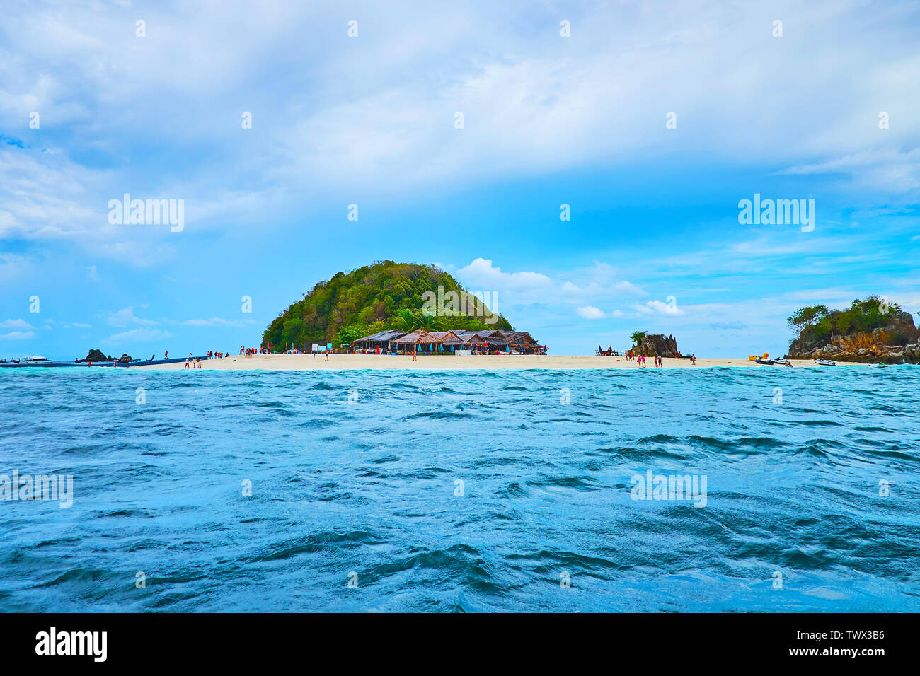 The speed-boat trip to the Khai Nok island with beautiful sand shore ...