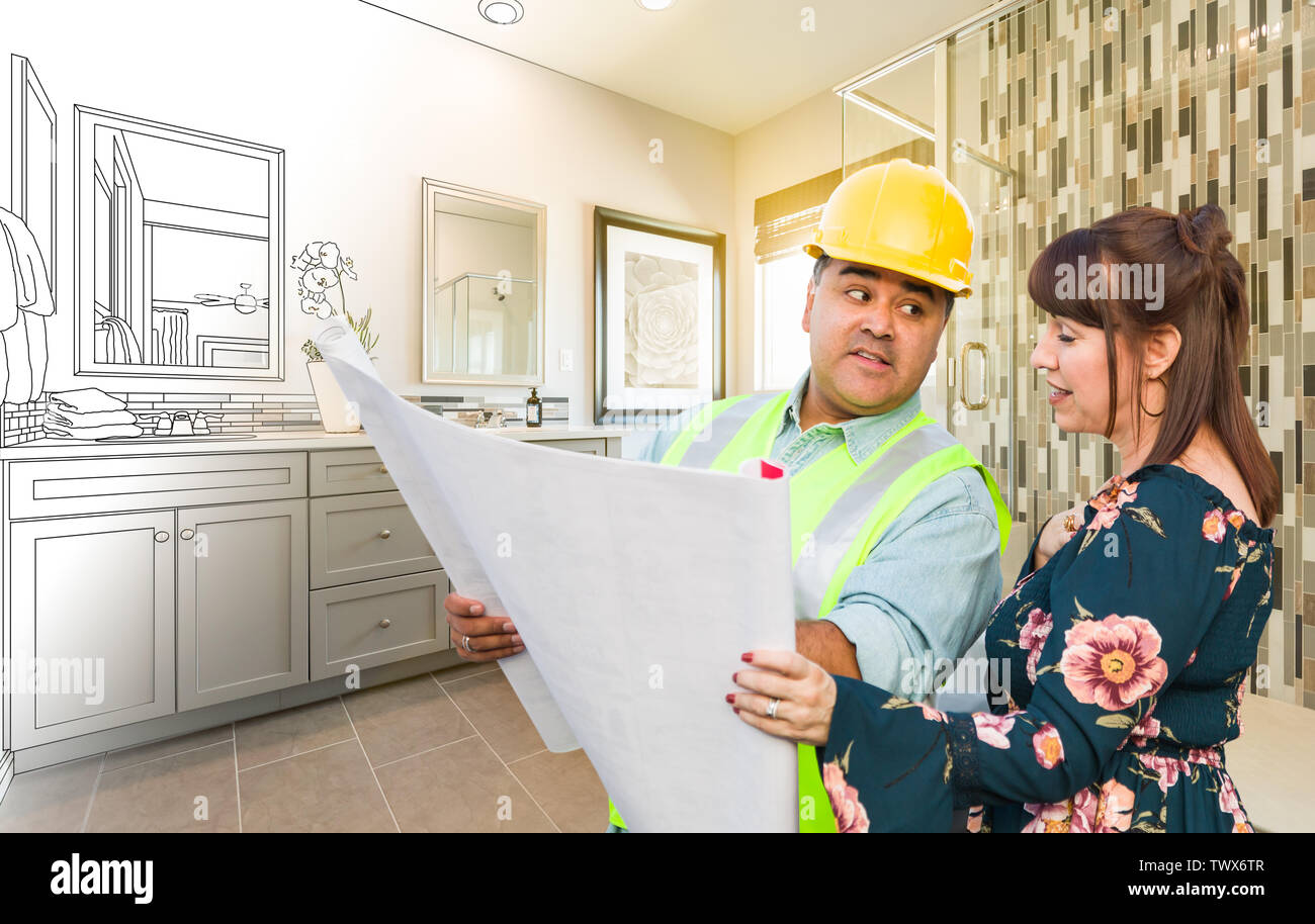 Hispanic Male Contractor Talking with Female Client Over Blueprint ...