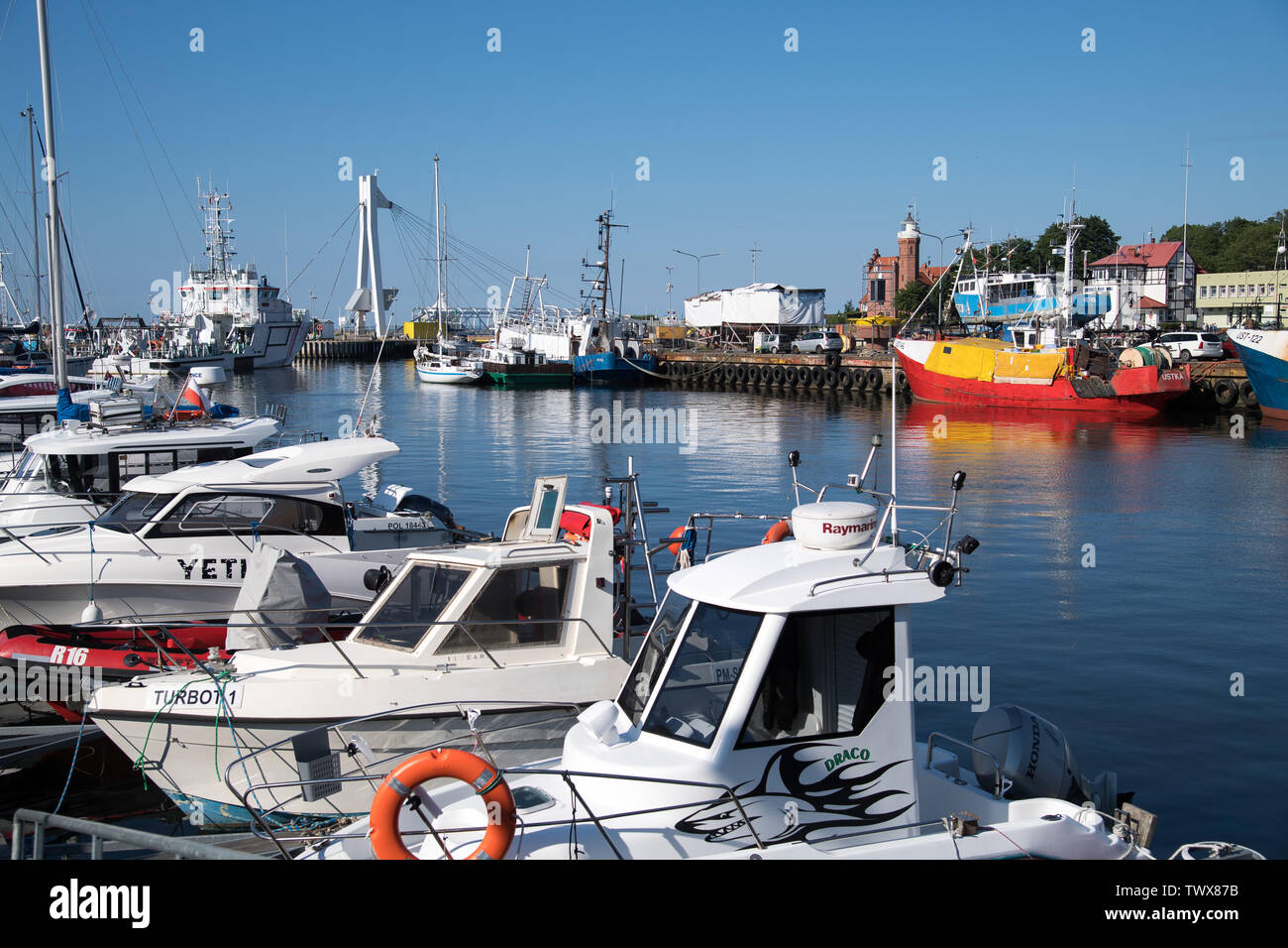 Fishing harbour and pedestrian bridge in Ustka, Poland June 17th 2019 ...