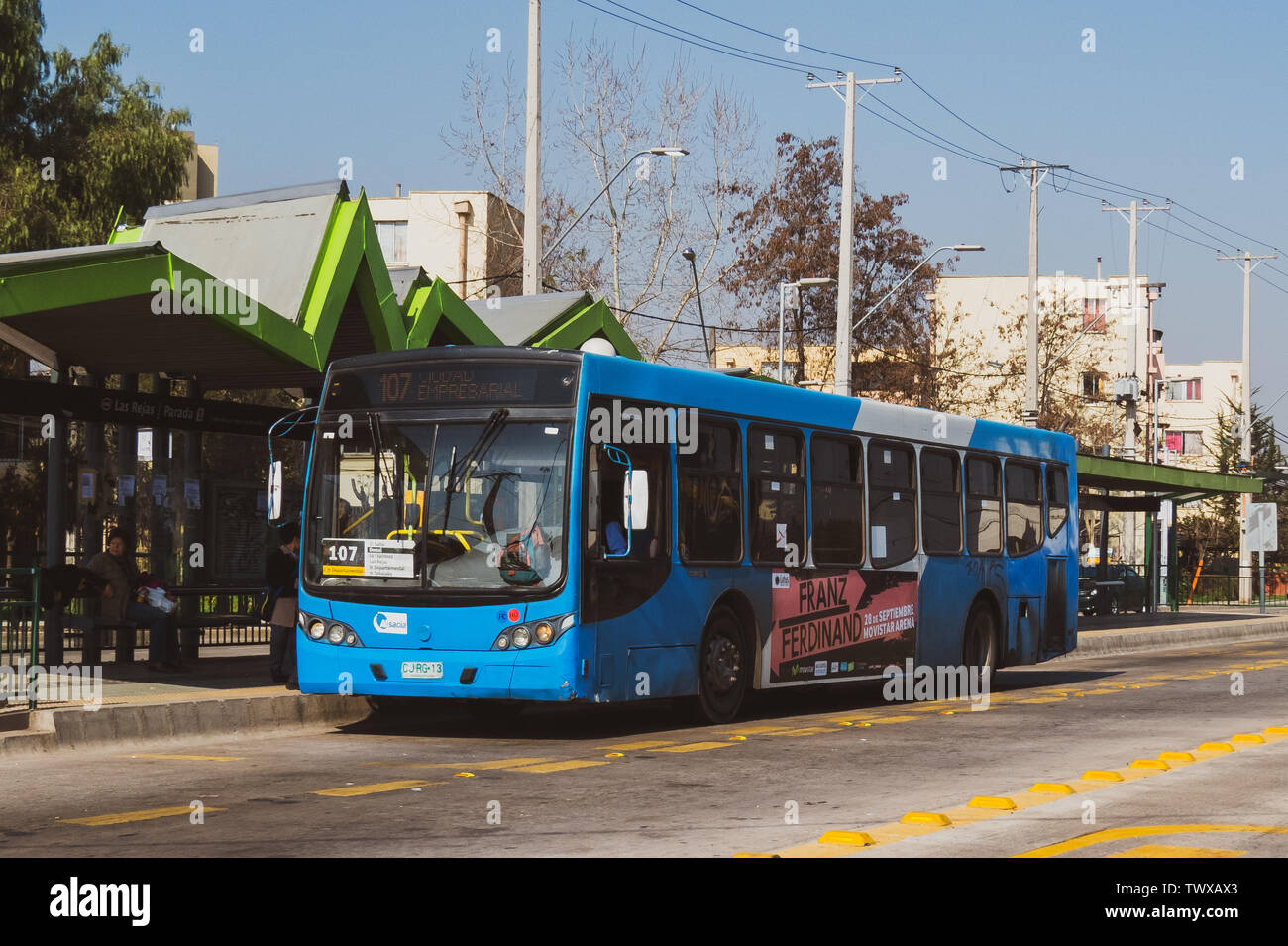 SANTIAGO, CHILE - AUGUST 2014: A Transantiago bus at a bus stop in Las ...
