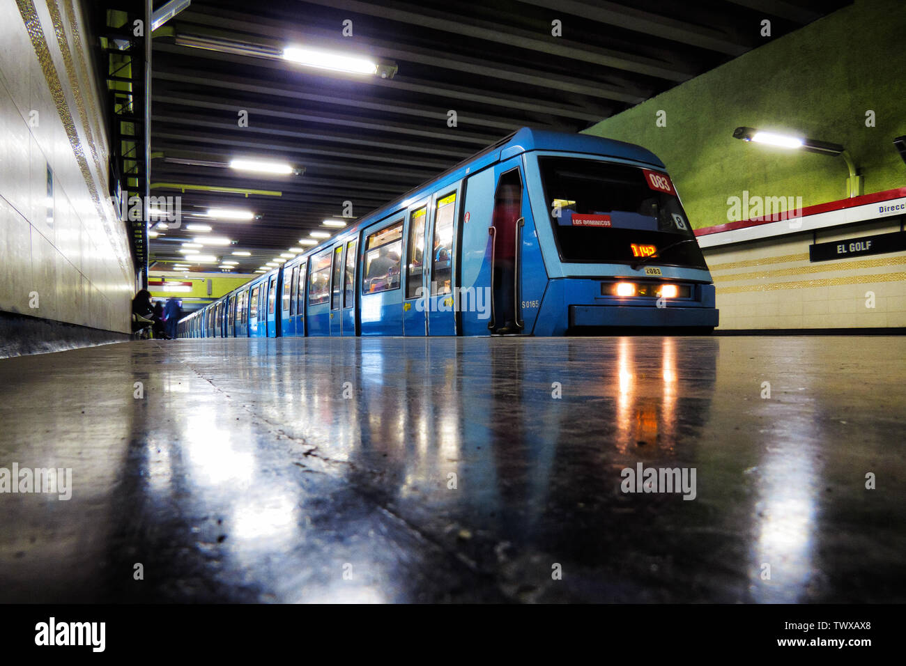 SANTIAGO, CHILE - AUGUST 2014: Metro de Santiago train at El Golf ...