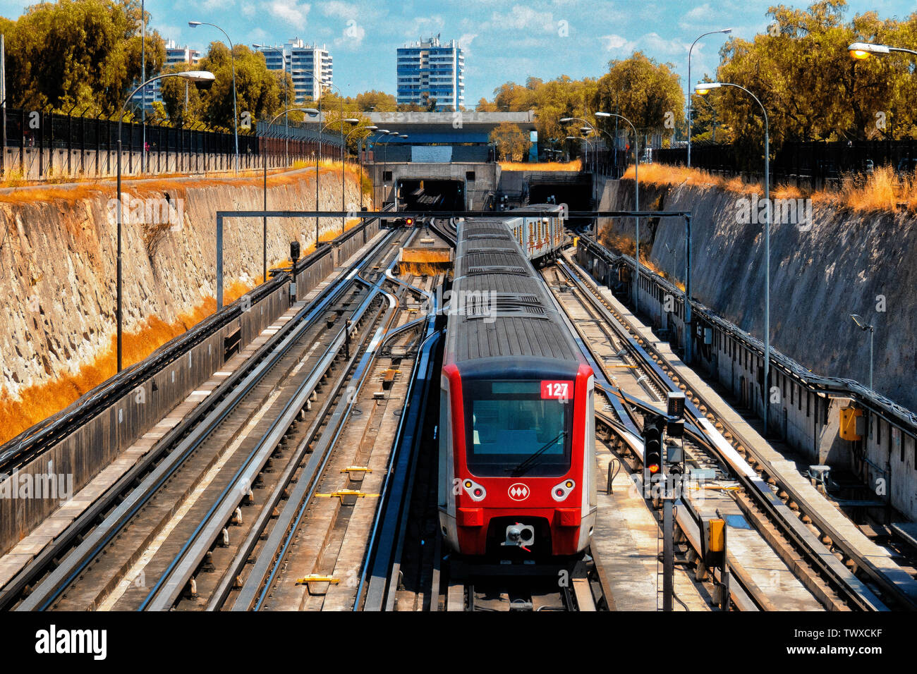 SANTIAGO, CHILE - NOVEMBER 2014: A Metro de Santiago train between two ...