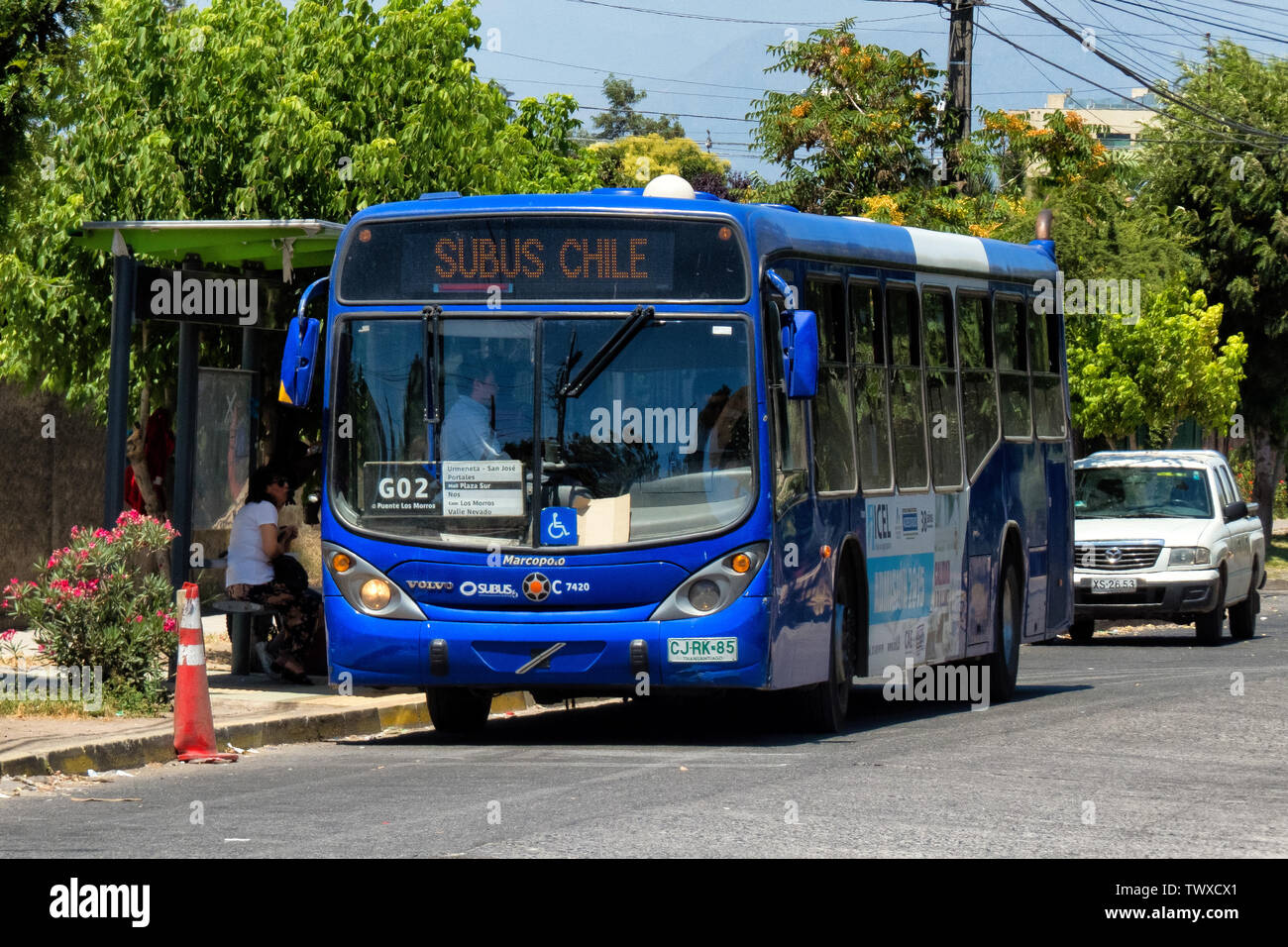 SANTIAGO, CHILE - DECEMBER 2014: A blue Transantiago bus stopped at its ...