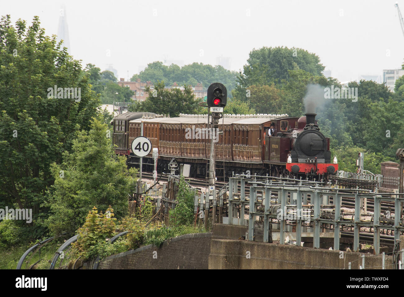 23 June 2019 - London - Metropolitan steam locomotive no 1 hauling a ...