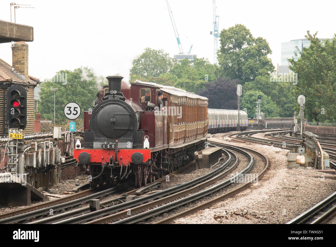23 June 2019 - London - Metropolitan steam locomotive no 1 hauling a ...