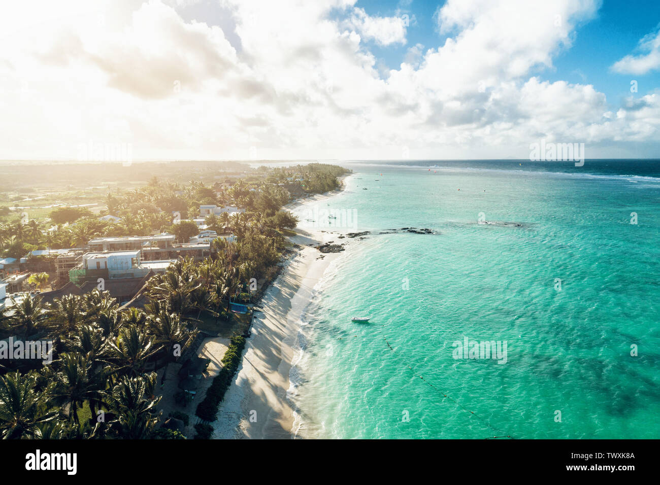 Aerial drone view at luxury resorts and coastline at Belle Mare beach ...