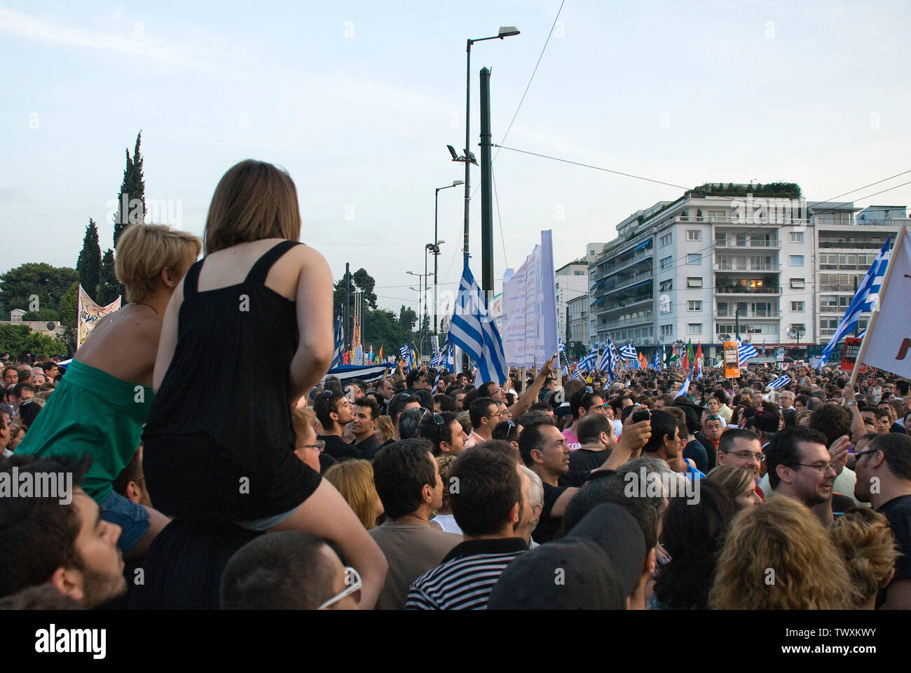 Protests against the austerity measures outside the Greek parliament in ...
