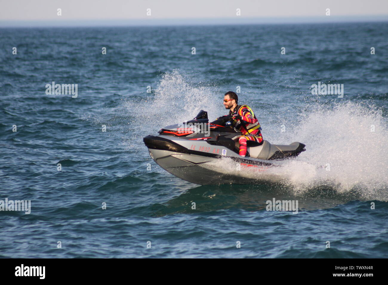 Riding the Wave Stock Photo - Alamy