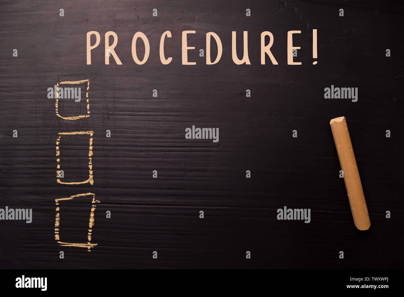 Procedure! written with color chalk. Supported by an additional ...