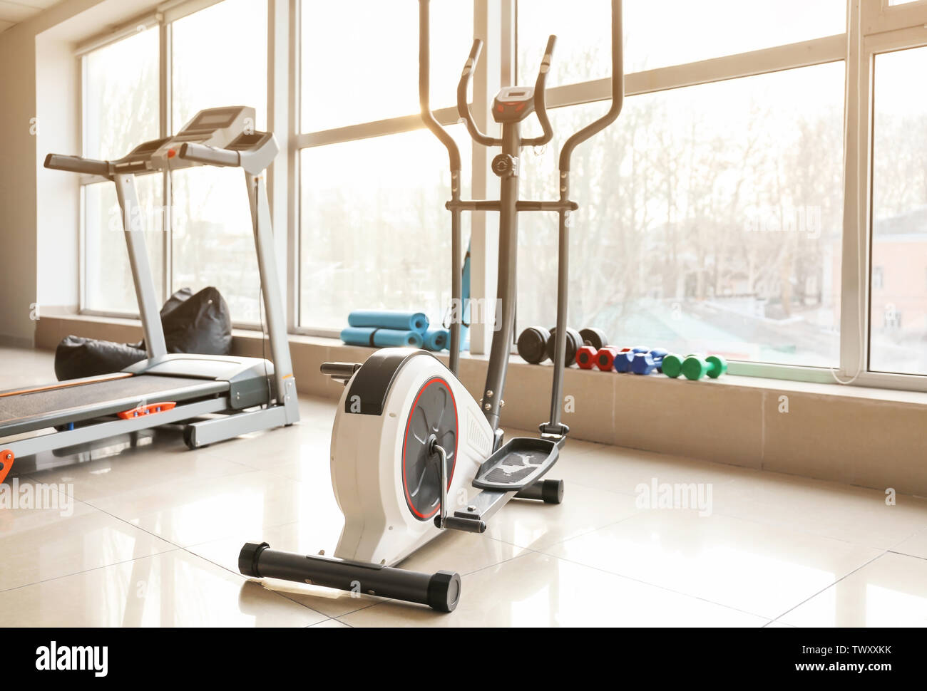 Interior of gym with modern equipment Stock Photo - Alamy