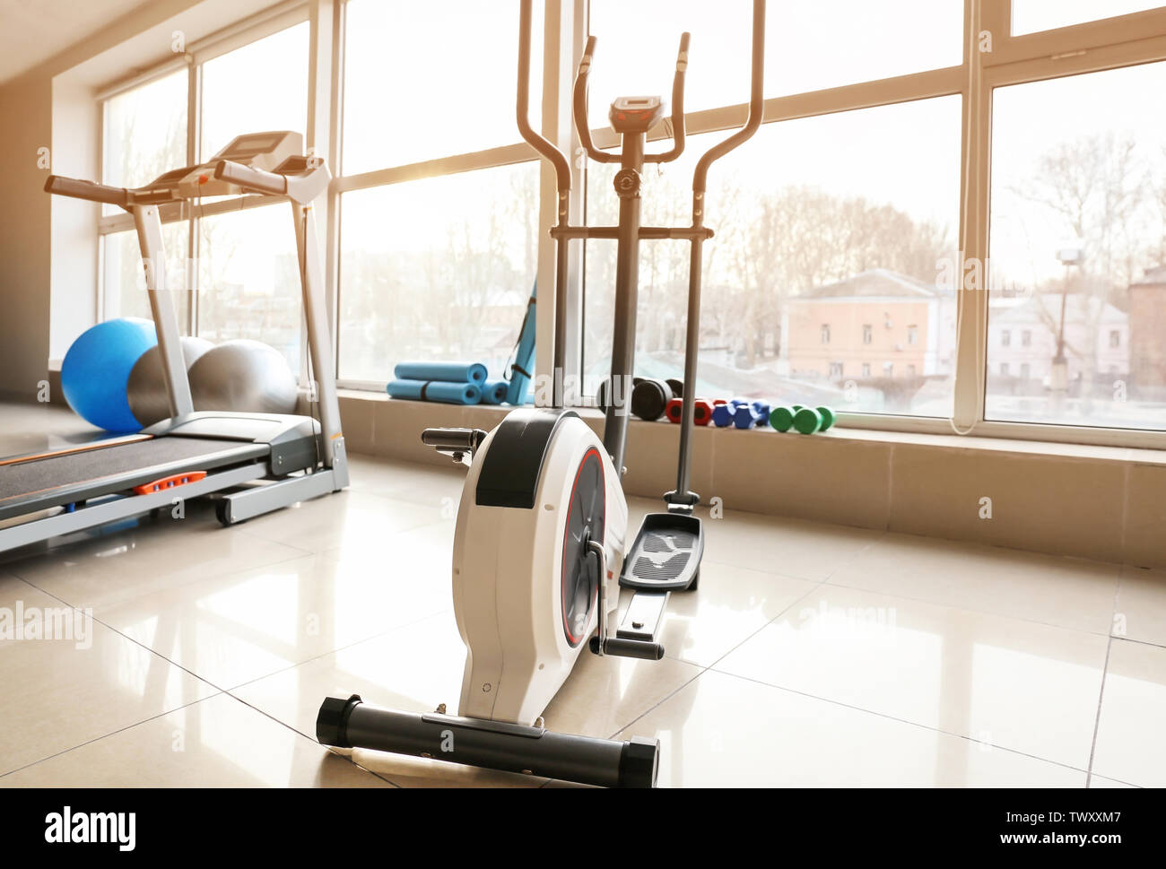 Interior of gym with modern equipment Stock Photo - Alamy