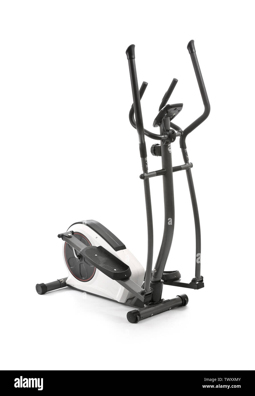 Modern exercise machine on white background Stock Photo - Alamy