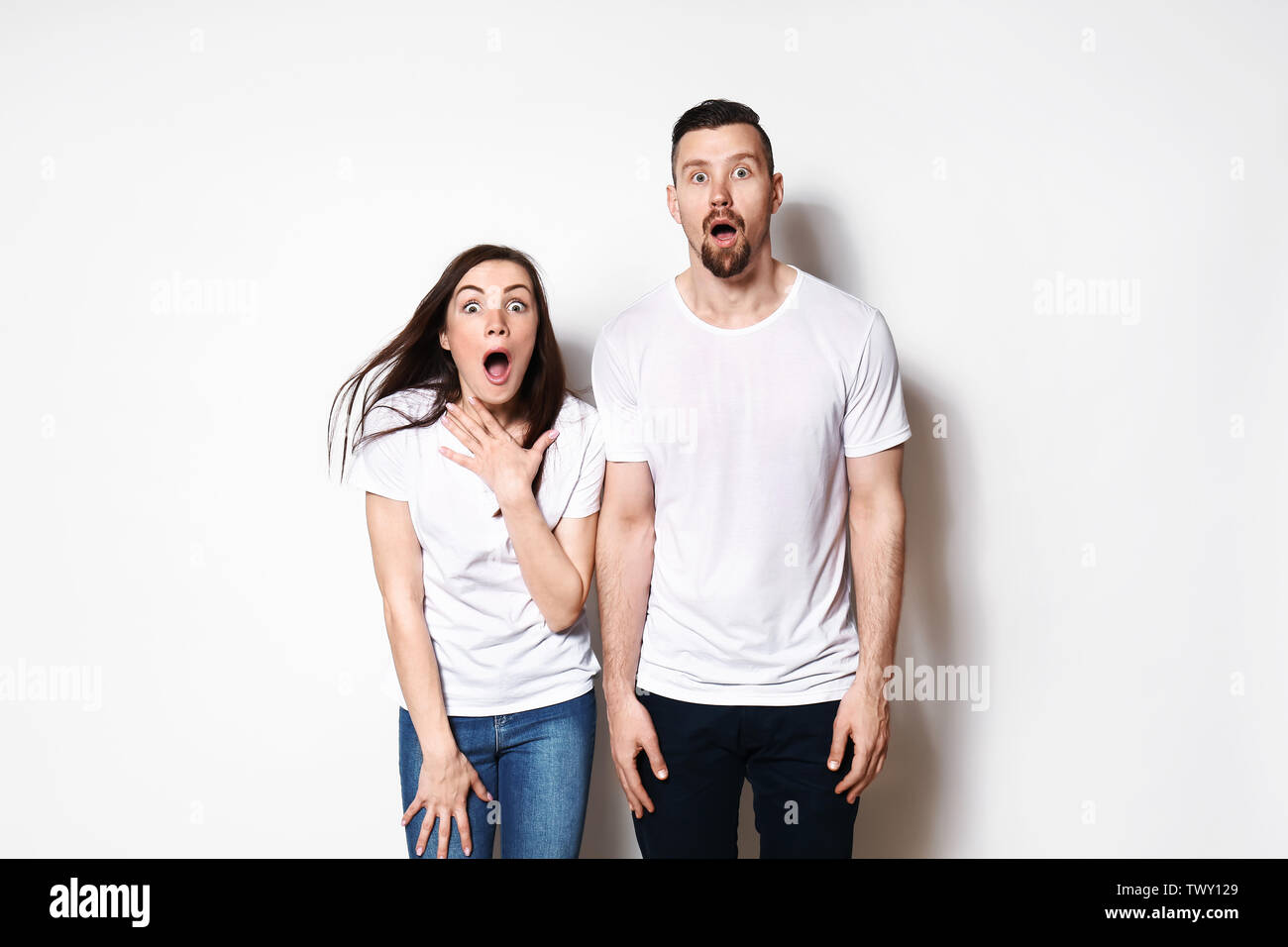 Beautiful shocked young couple hi-res stock photography and images - Alamy