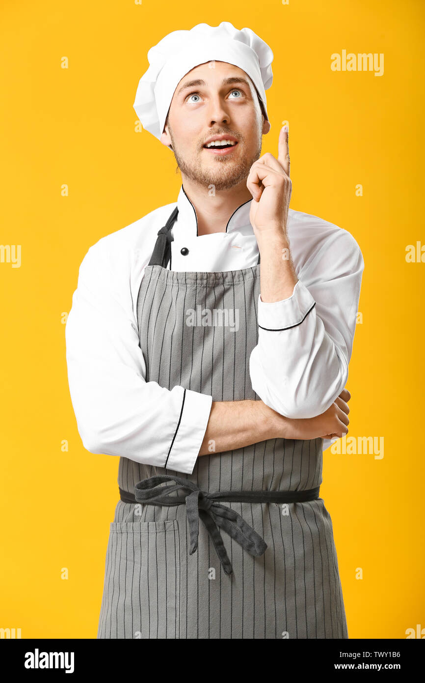 Handsome male chef pointing hi-res stock photography and images - Alamy