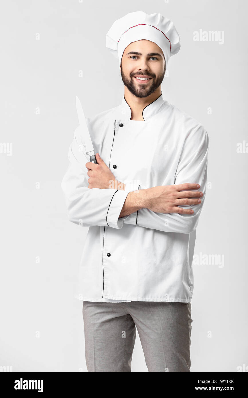 Handsome male chef on white background Stock Photo - Alamy