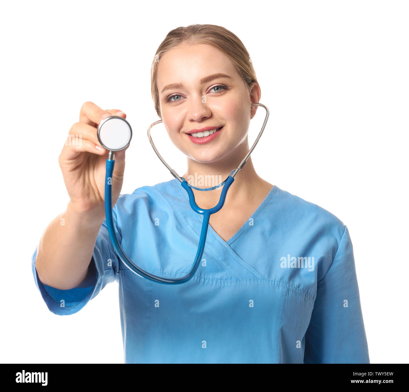 Young medical assistant with stethoscope on white background Stock ...