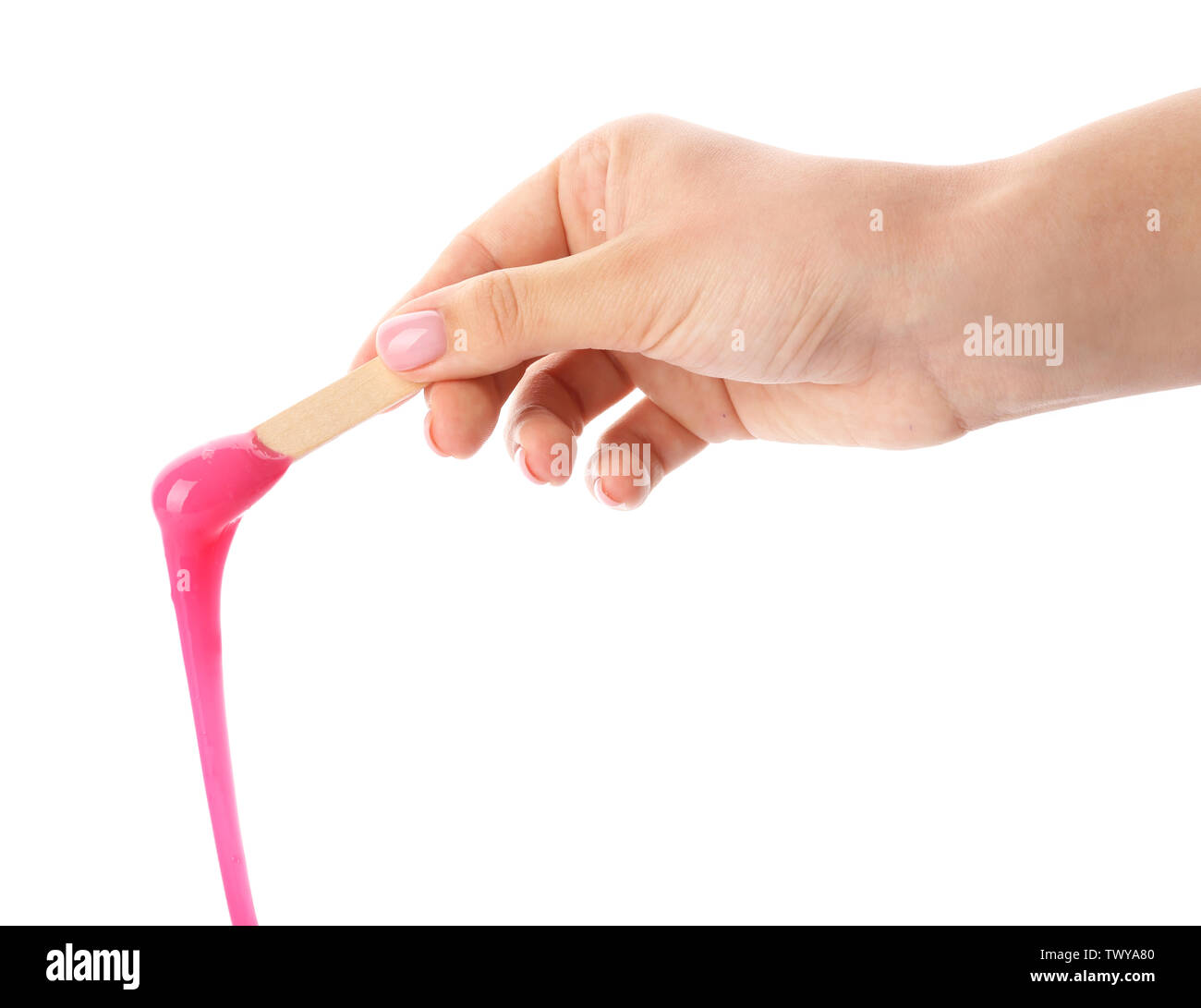 Female hand with sugaring paste on stick against white background Stock ...