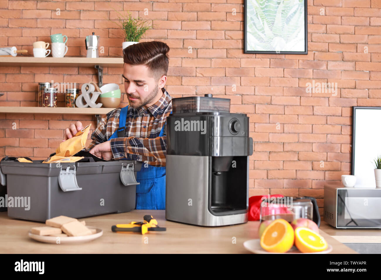Broken coffee machine hi-res stock photography and images - Alamy