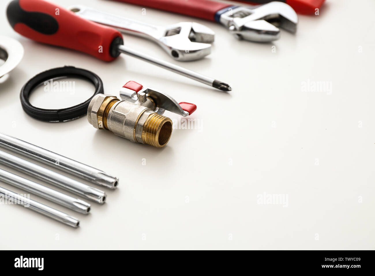 Plumbing items on white background Stock Photo - Alamy