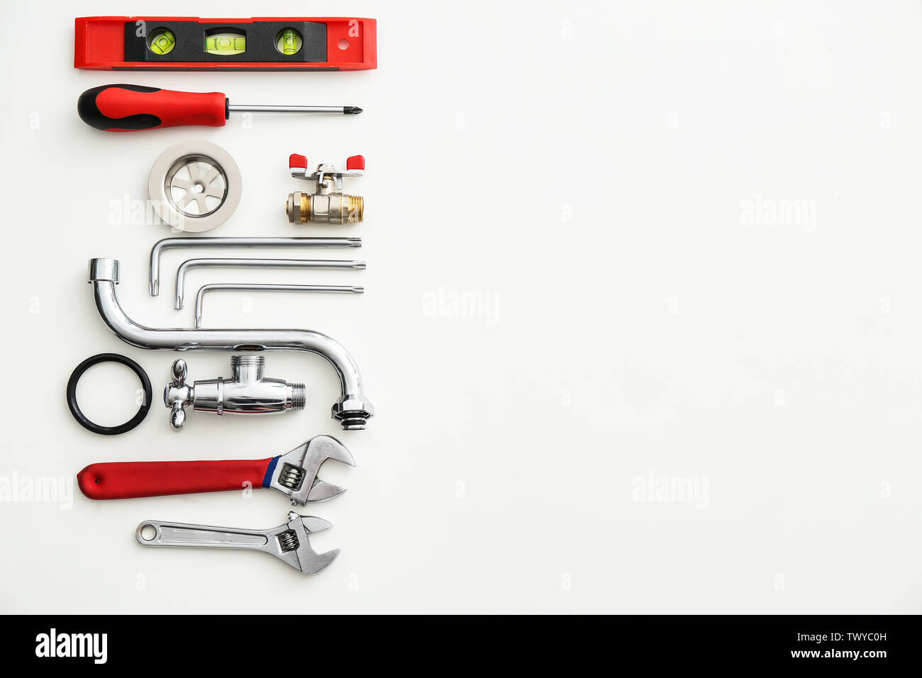 Plumbing items on white background Stock Photo - Alamy