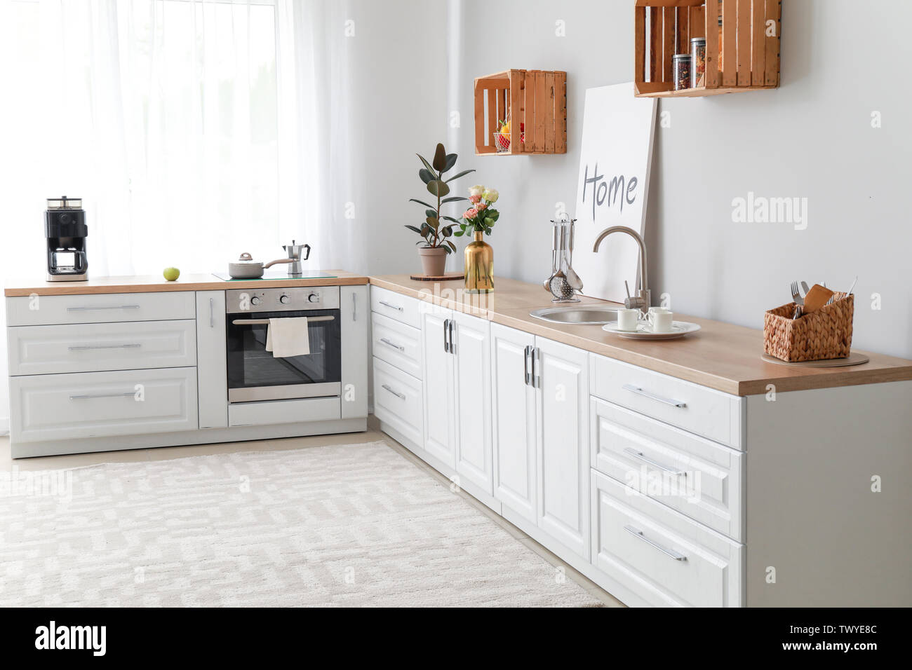 Interior of modern comfortable kitchen Stock Photo - Alamy