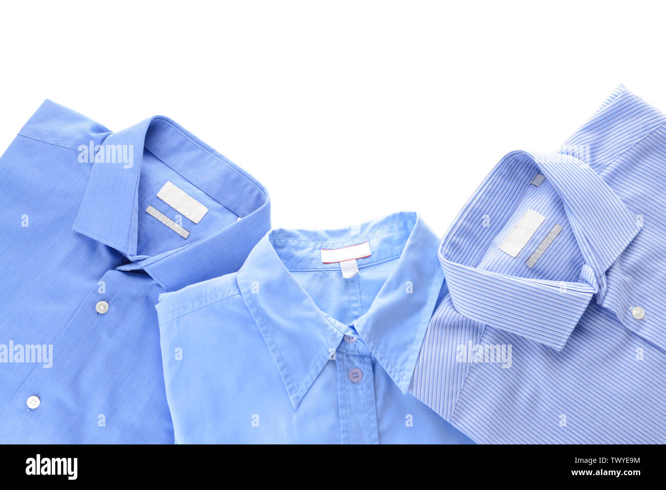 Shirts after dry-cleaning on white background Stock Photo - Alamy
