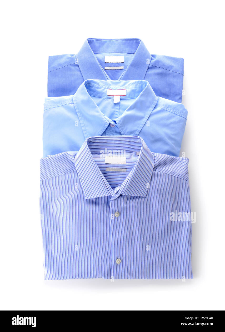 Shirts after dry-cleaning on white background Stock Photo - Alamy
