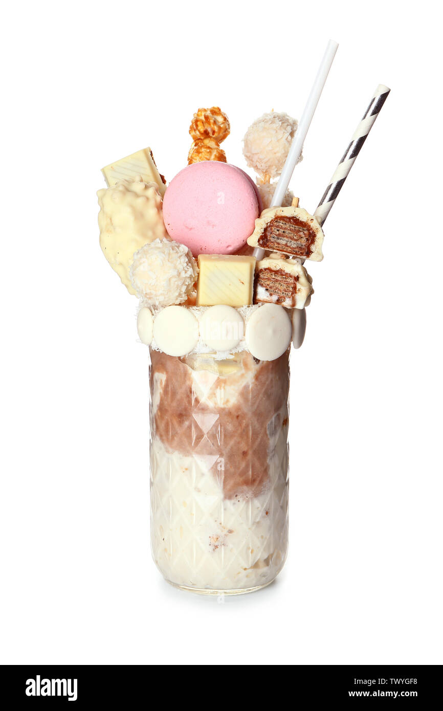 Glass with delicious freak shake on white background Stock Photo - Alamy