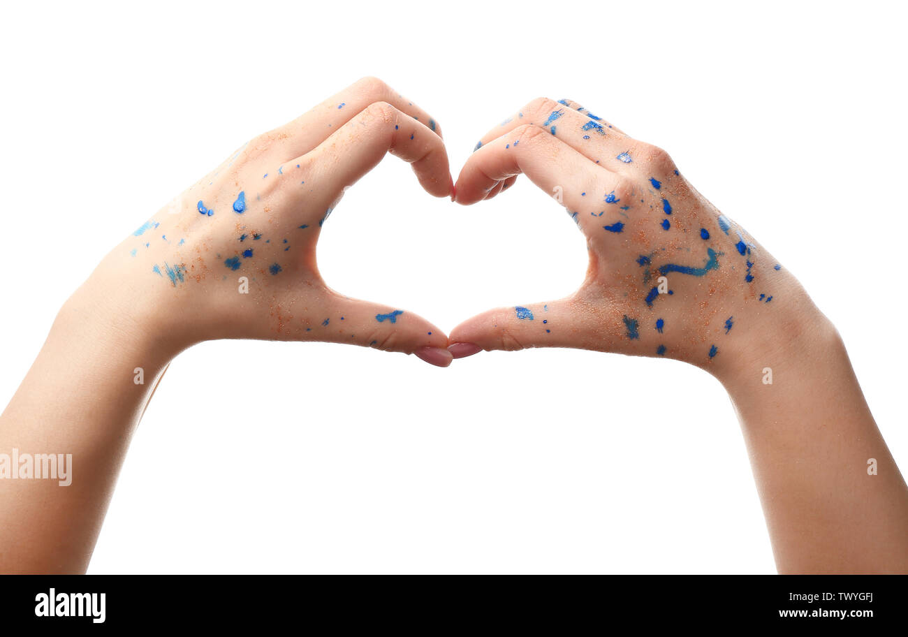 Female hands with paint showing heart shape on white background Stock ...