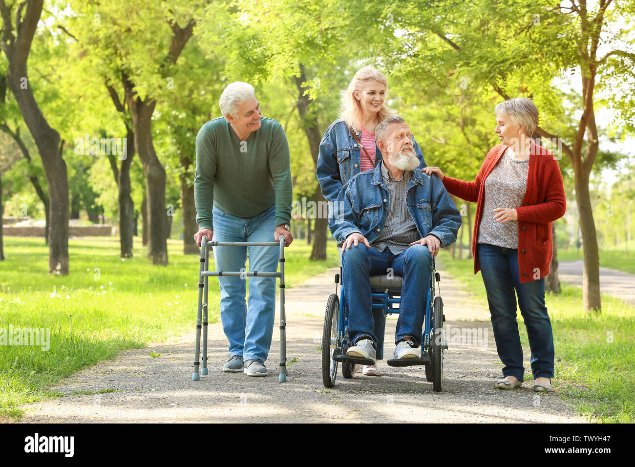 Old people walking hi-res stock photography and images - Alamy