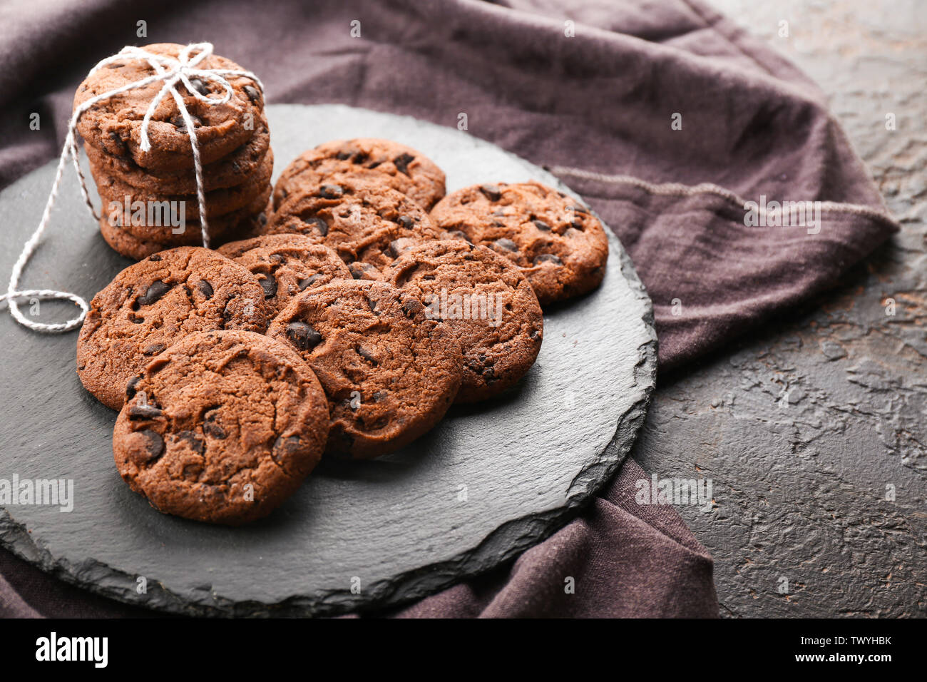 Tasty chocolate cookies on slate plate Stock Photo - Alamy