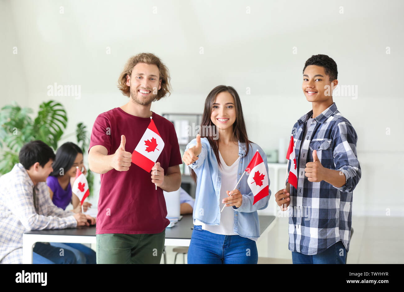 Teenage students studying in classroom hi-res stock photography and ...