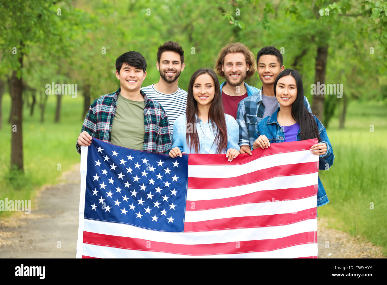 Group of students with USA flag outdoors Stock Photo - Alamy