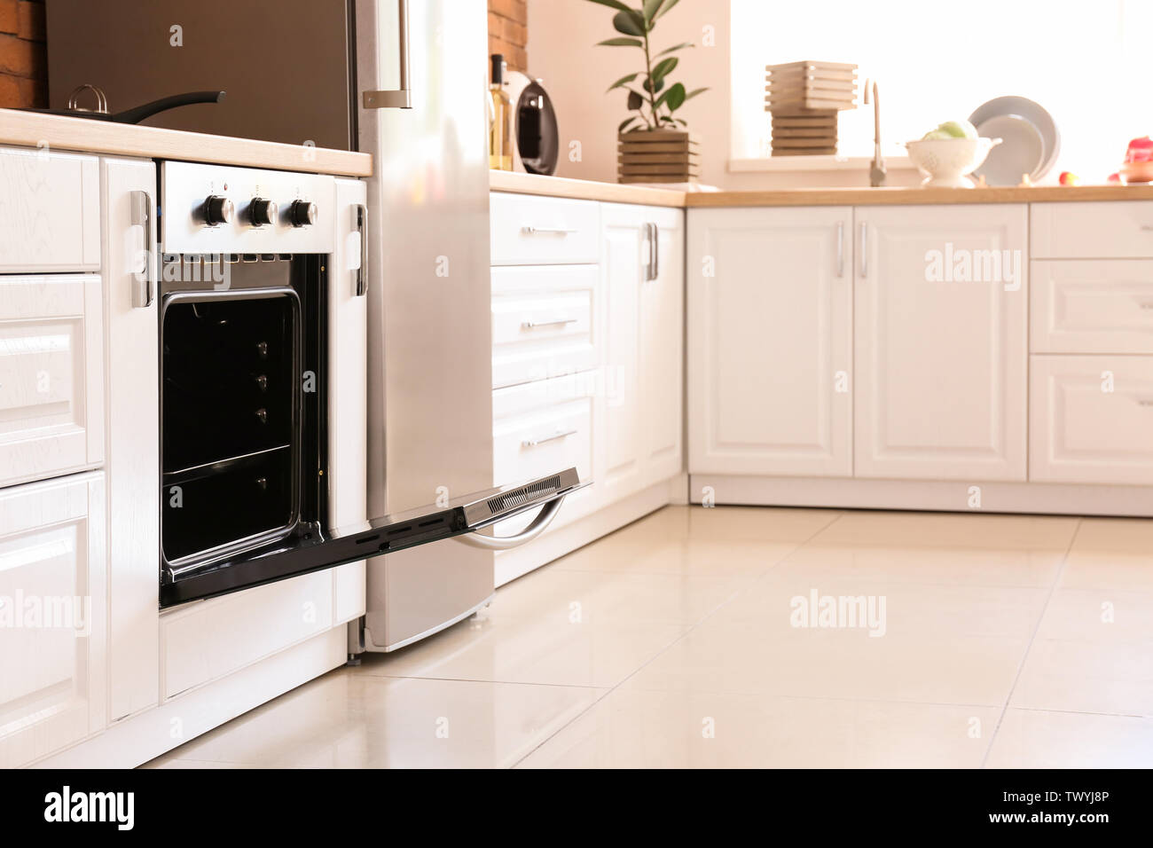 Interior of kitchen with modern oven Stock Photo - Alamy